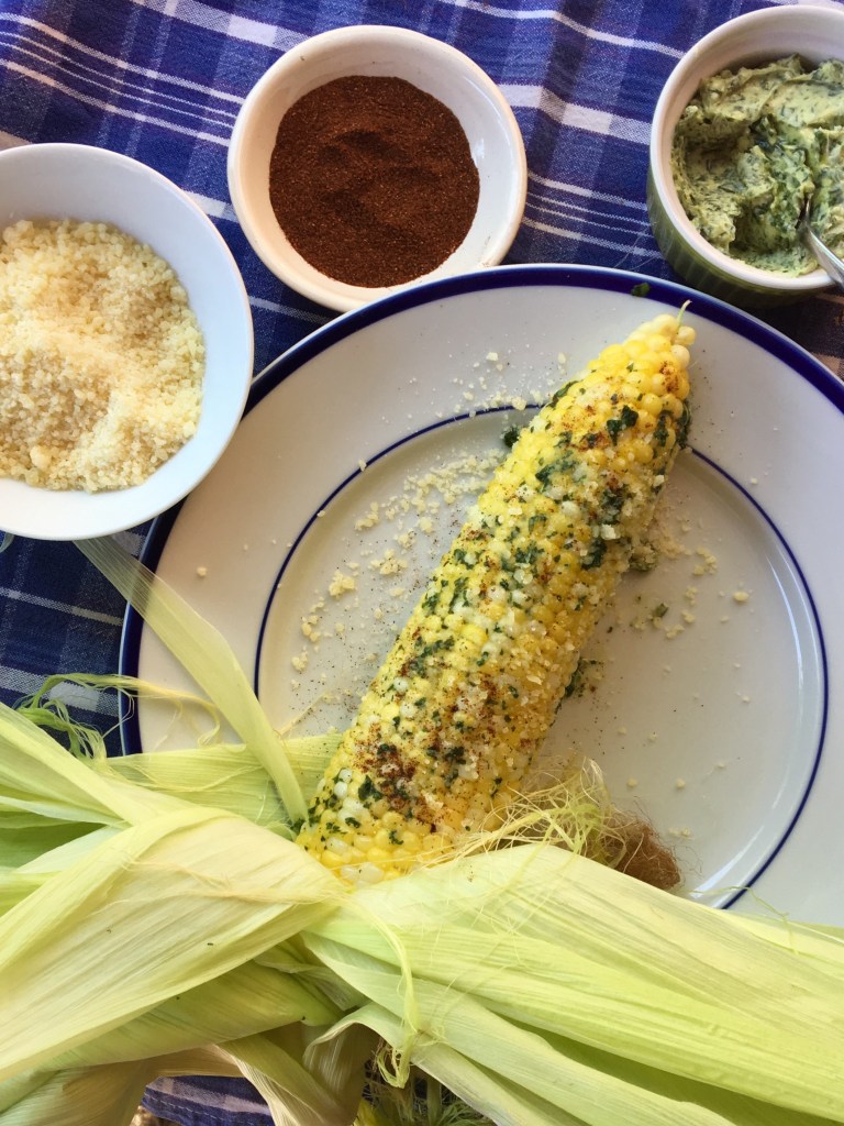 Corn on the cob with basil butter, parmesan cheese and chipotle chile ...
